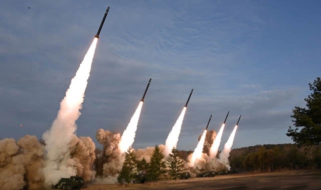 N. Korea's Kim oversees 'super-large' rocket launcher drills | The ...